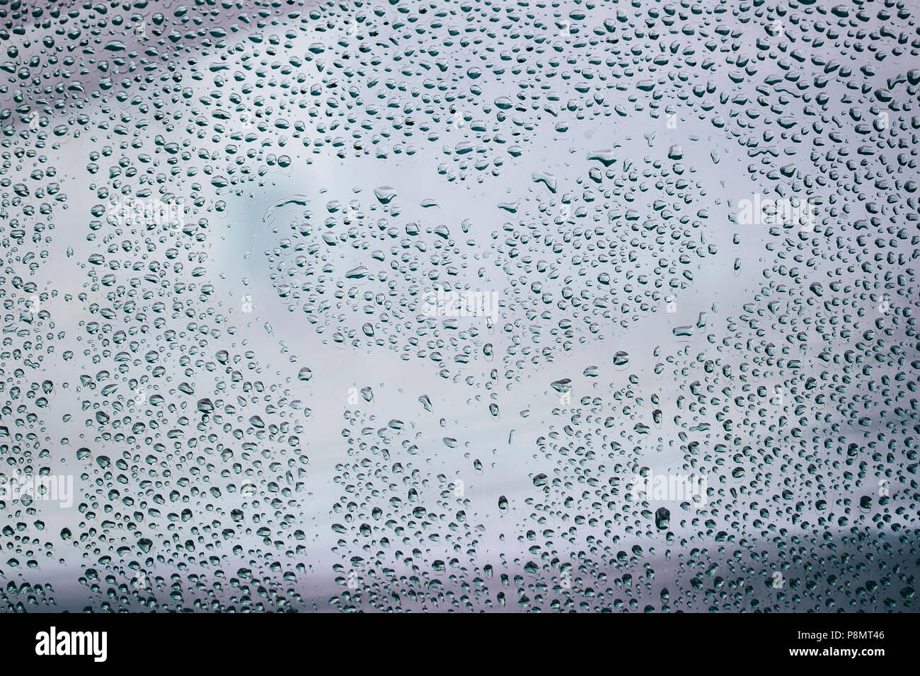 Heart and raindrops. Drawn romantic blurred love symbol drawn by hand ...