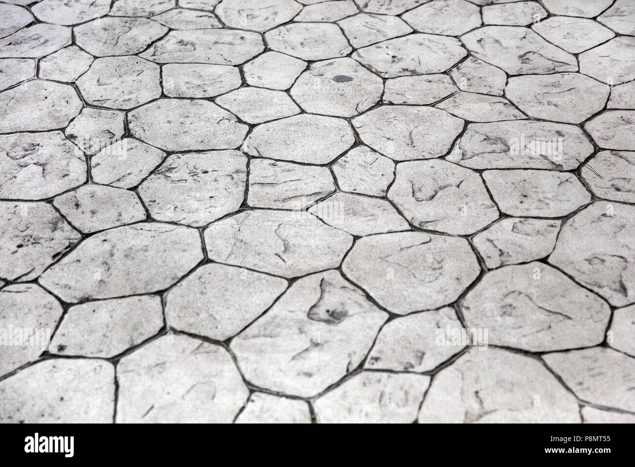 Closeup detail of the irregular stone pathway Stock Photo - Alamy