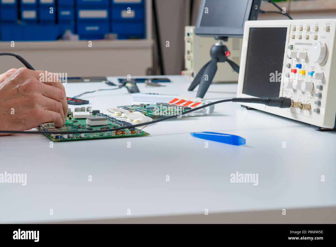 To repair the PCB of a modern monitor at the service center. Laboratory ...