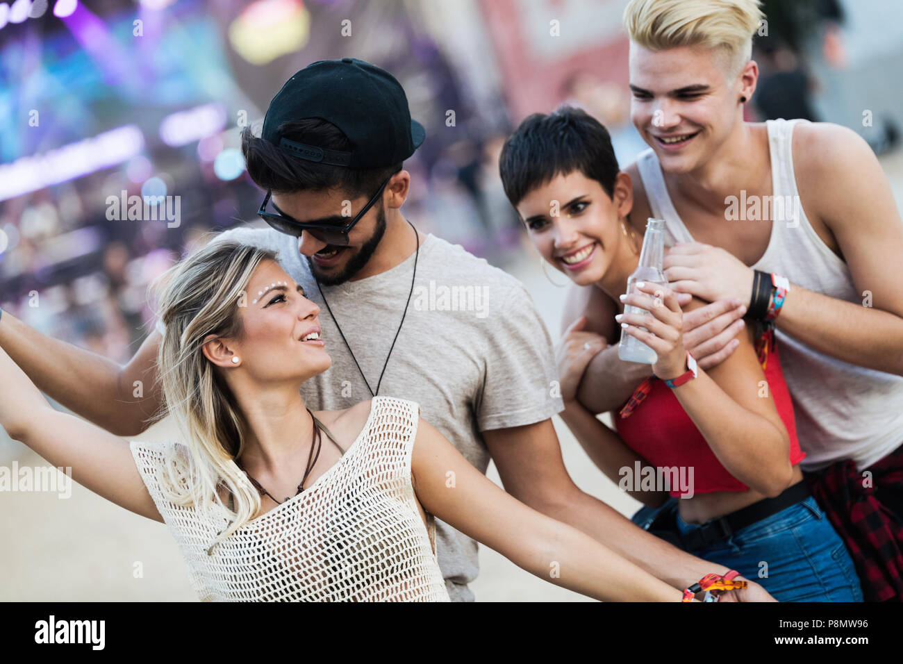 Young friends music festival hi-res stock photography and images - Alamy
