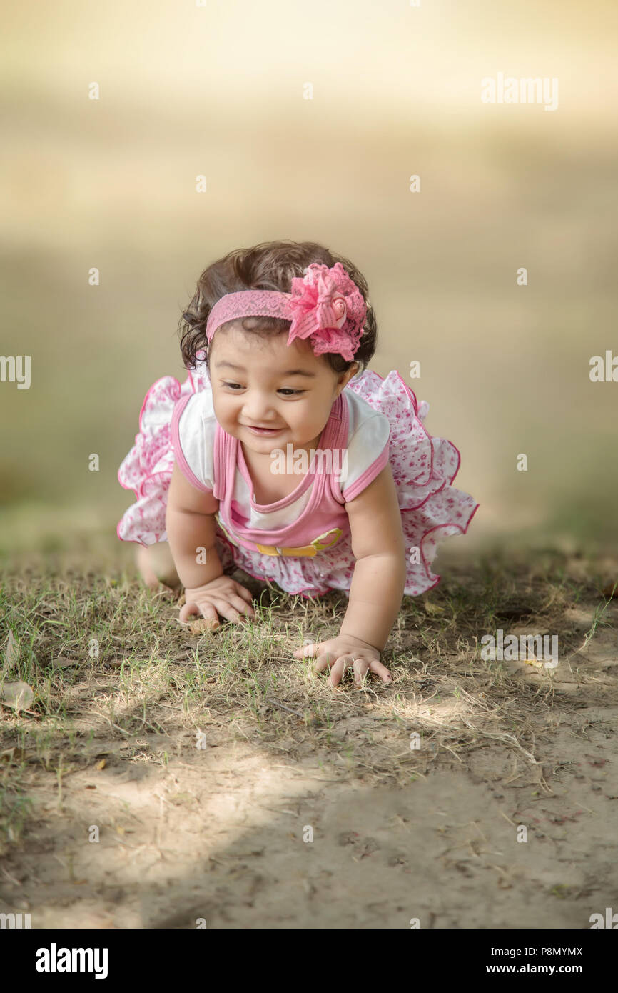 Indian Kid Crawling High Resolution Stock Photography and Images - Alamy