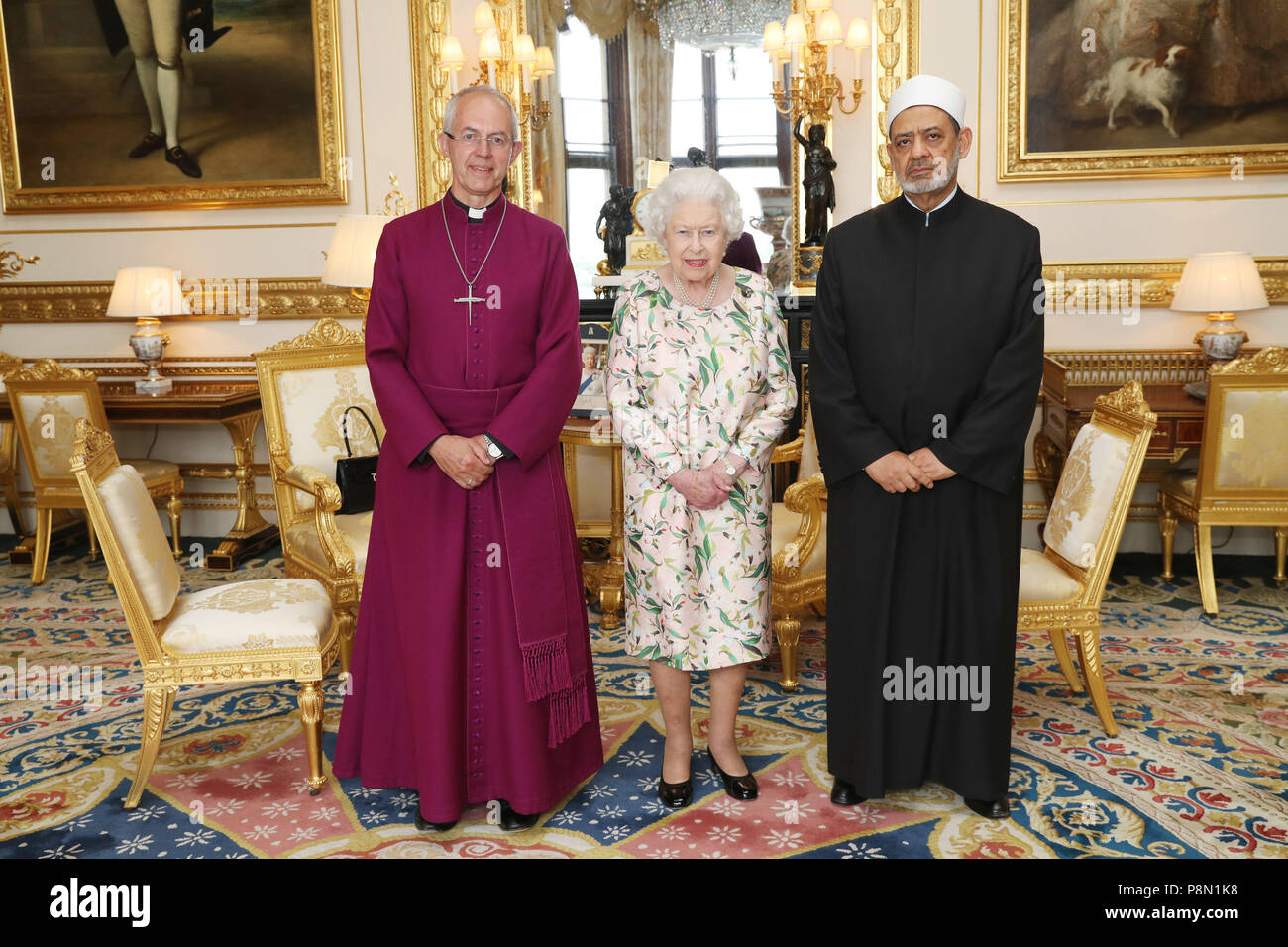 Queen Elizabeth II stands between Justin Welby, the Archbishop of ...