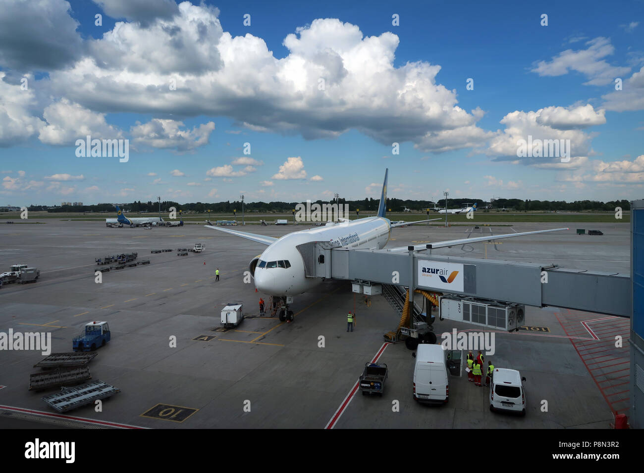 A Boeing airplane of Ukraine International Airlines with jet bridge ...