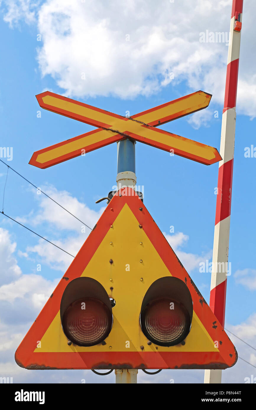 Level Crossing Saltire Sign With Lights And Ramp Stock Photo - Alamy