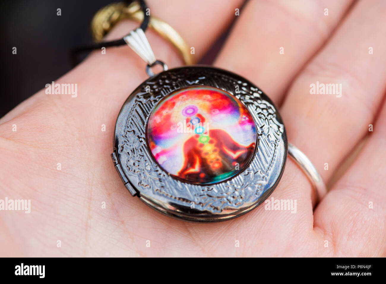 Little jewellery with colorful esoteric design Stock Photo - Alamy