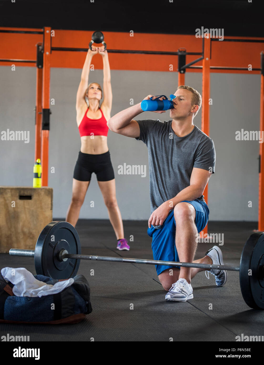 Man and woman working out Stock Photo - Alamy