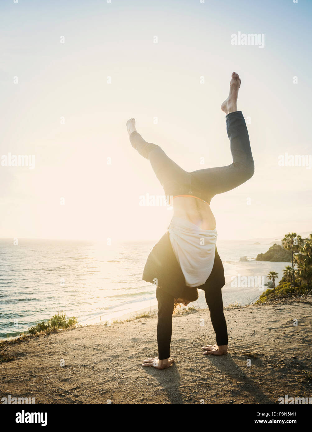 Handstand on beach hi-res stock photography and images - Alamy