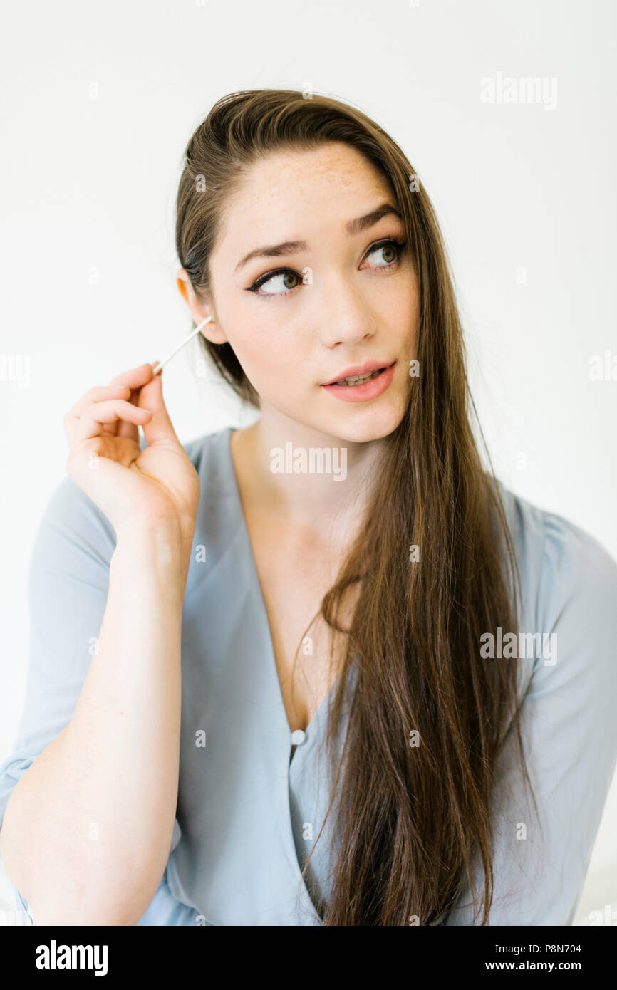 Ear cleaning woman hi-res stock photography and images - Alamy