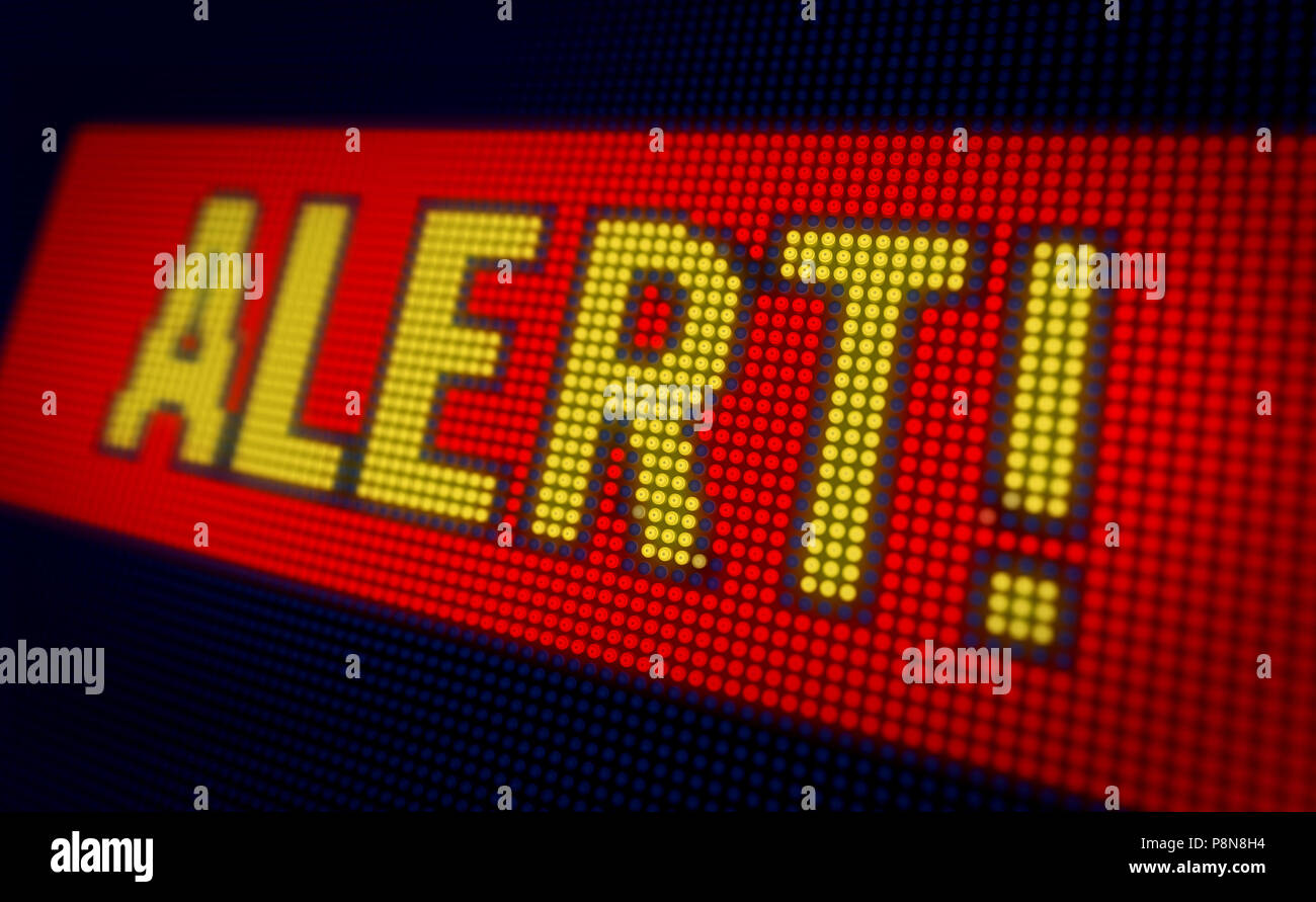 Alert word on big LED display with large pixels. Bright light warning ...