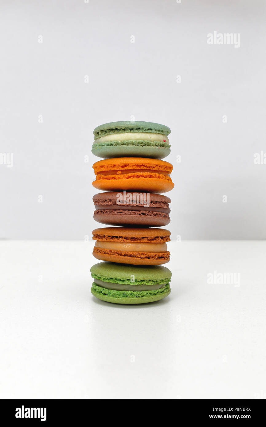 Five Stacked Macarons in different flavors and colors Stock Photo - Alamy
