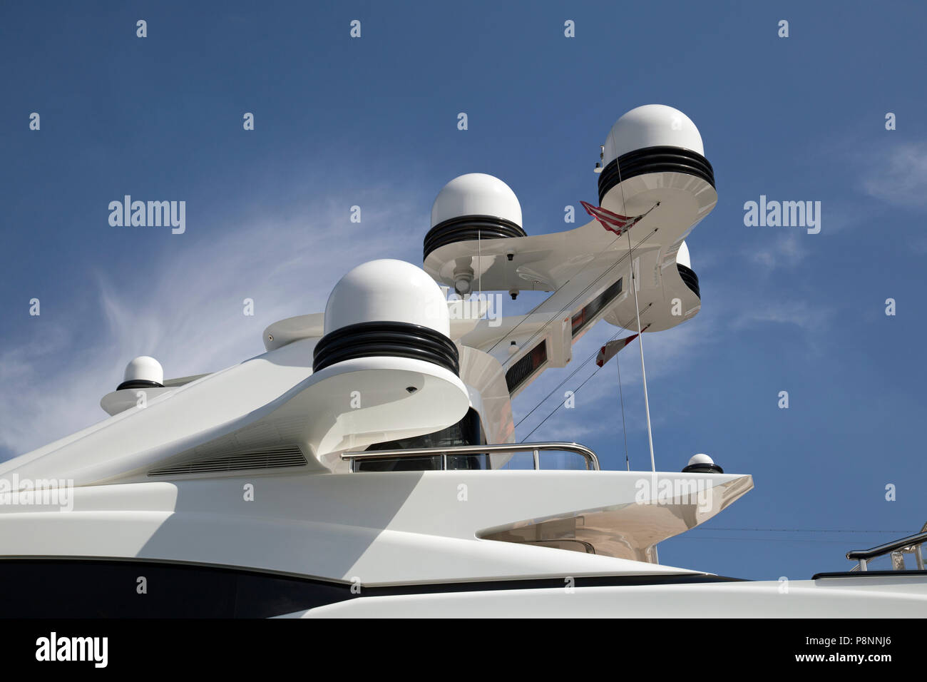 Yacht Radar units on top of a luxury yacht against a blue sky Stock ...