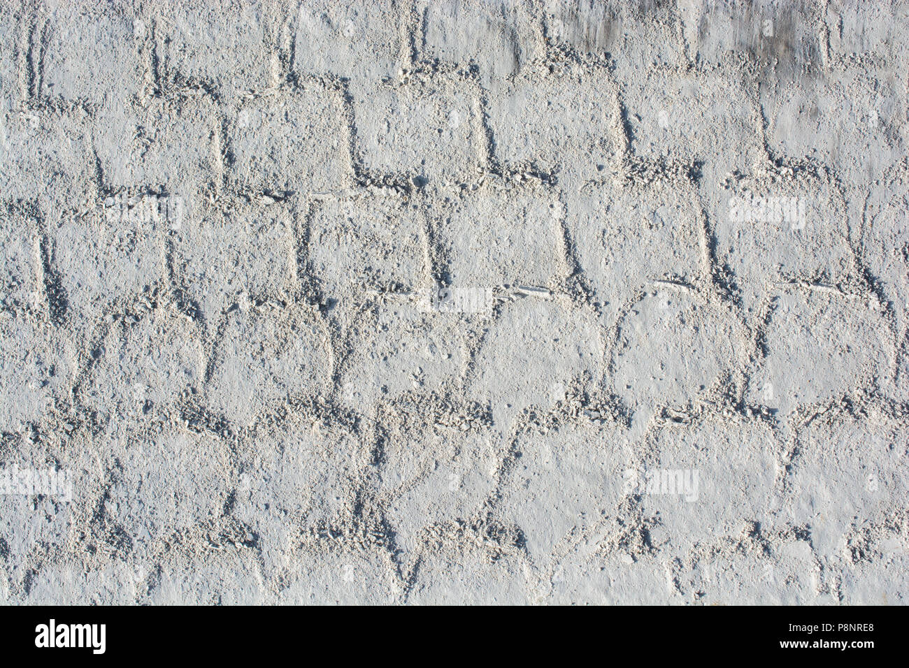 Patterns on a freshly poured concrete surface Stock Photo - Alamy