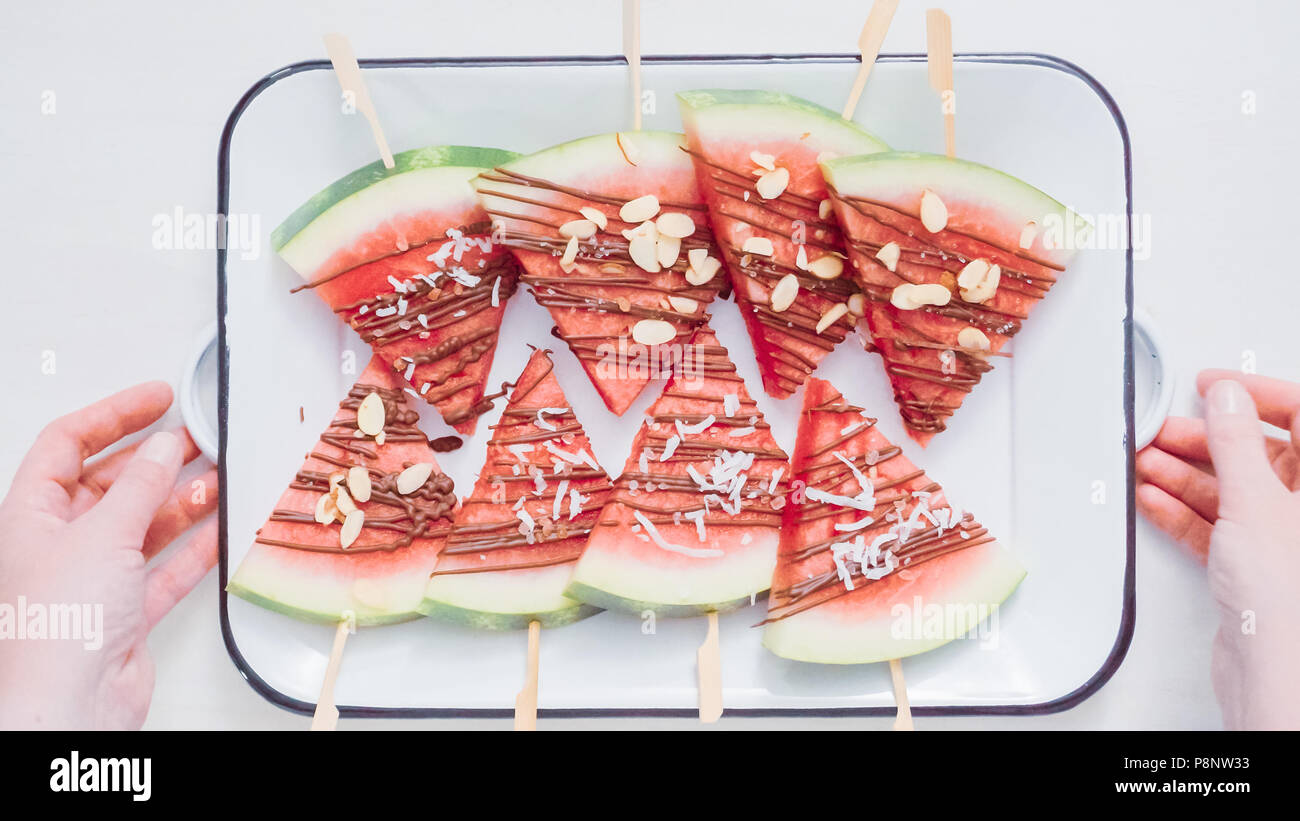 Step by step. Watermelon wedges garnished with chocolate and sea salt ...