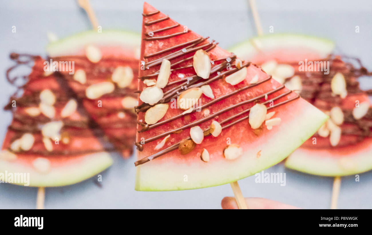 Step step watermelon wedges garnished hi-res stock photography and ...
