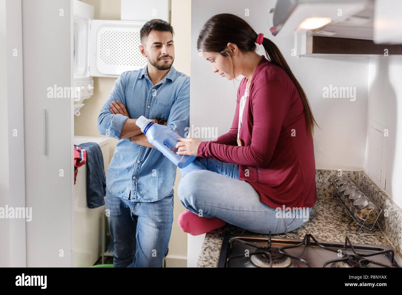 Man And Woman Doing Chores Washing Clothes Stock Photo - Alamy