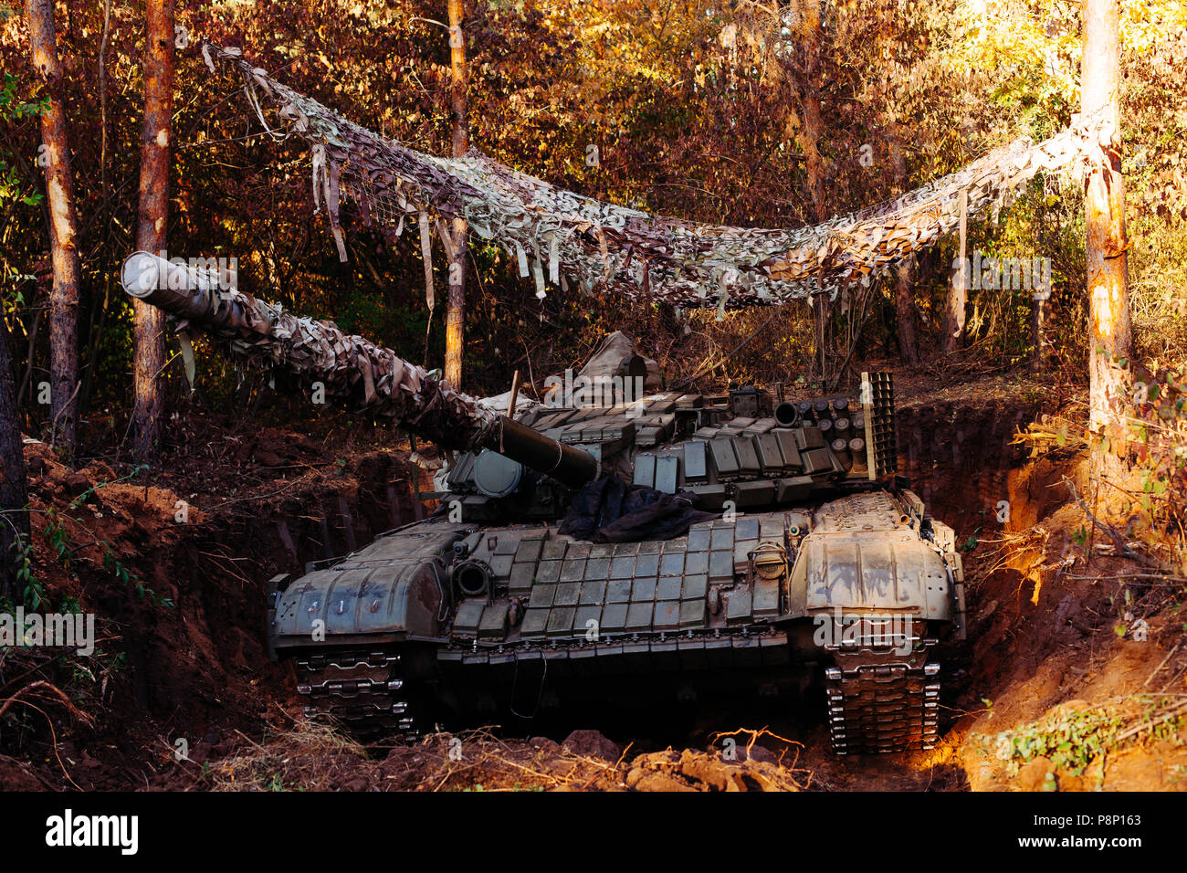 The tank from the hidden position is disguised in the trench Stock ...