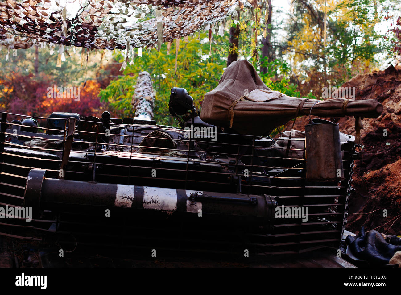 The tank from the hidden position is disguised in the trench Stock ...