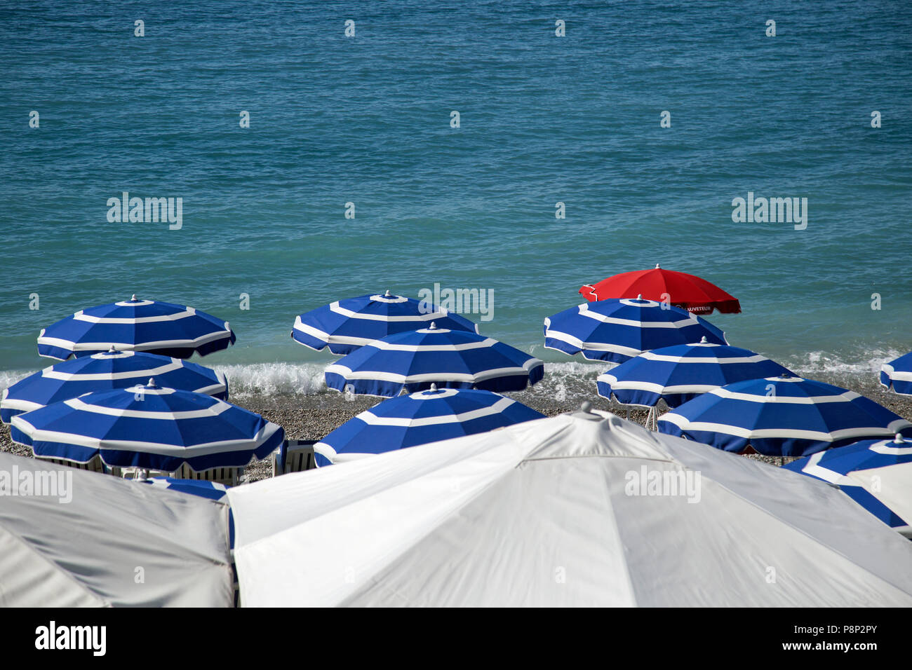 Blue and white parasols hi-res stock photography and images - Alamy