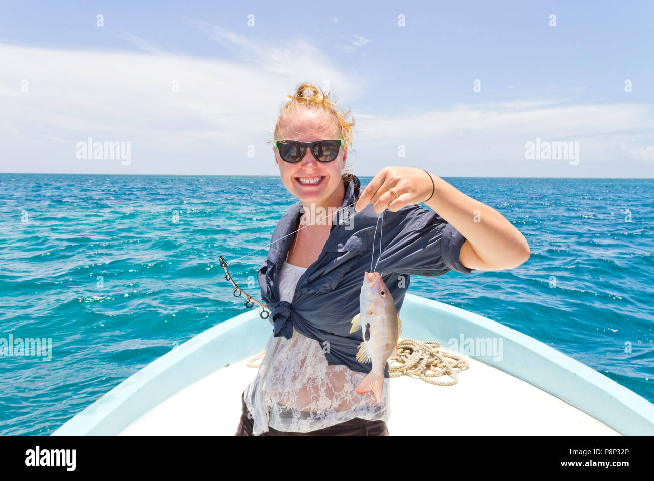 Woman holds up hi-res stock photography and images - Alamy