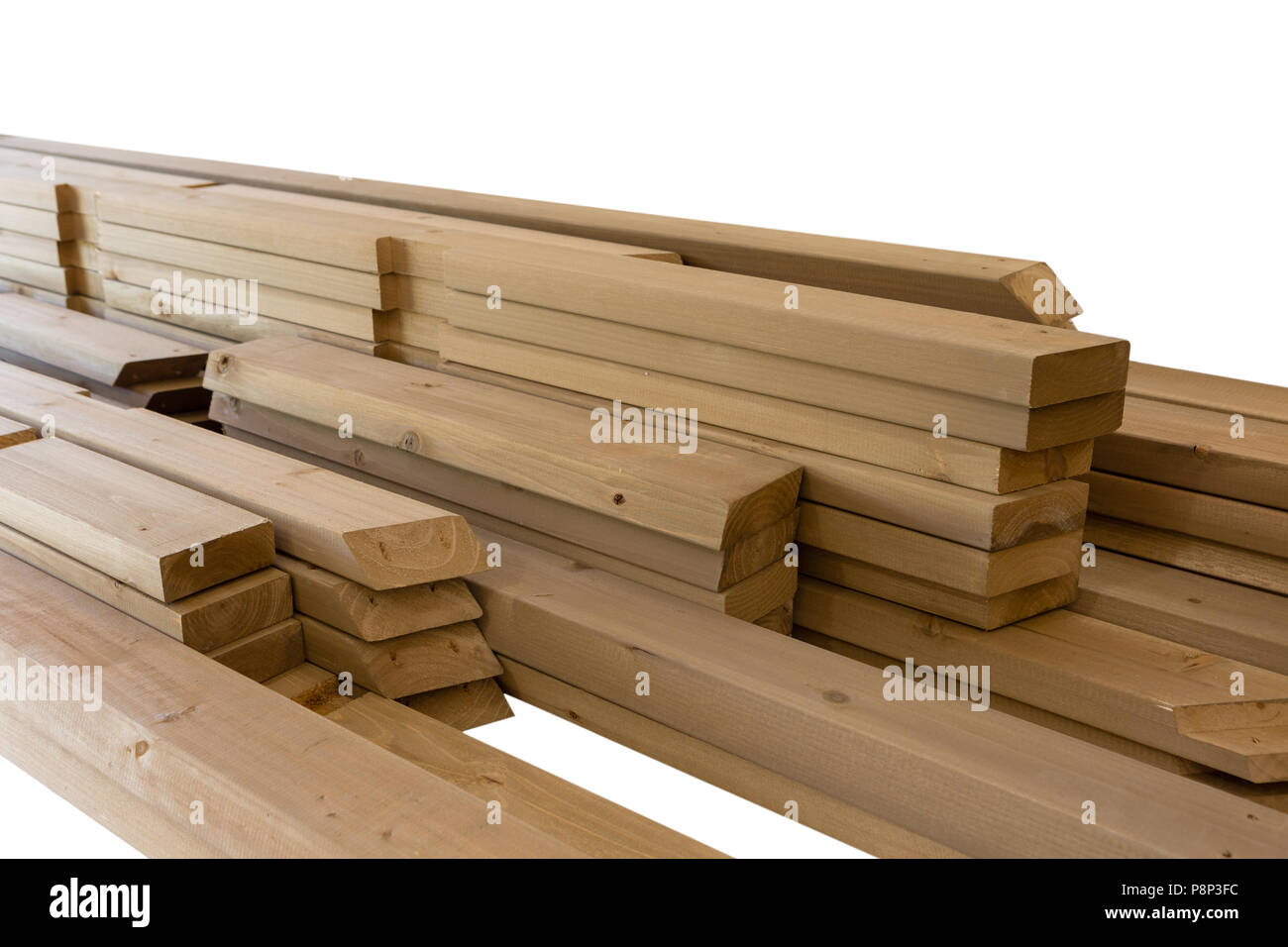 Pile of wooden planks isolated against white background Stock Photo - Alamy