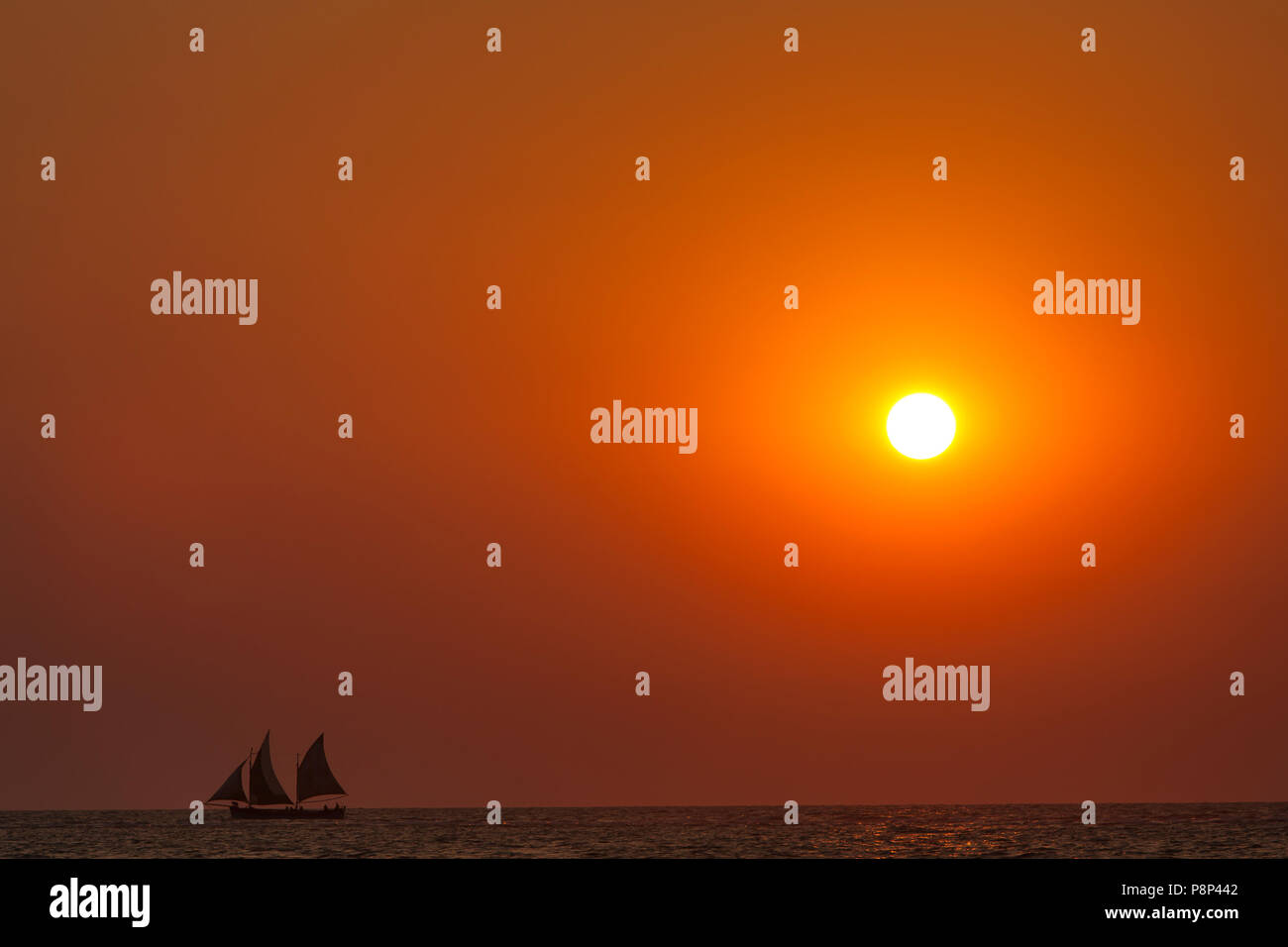 sailboat at sunset Stock Photo - Alamy
