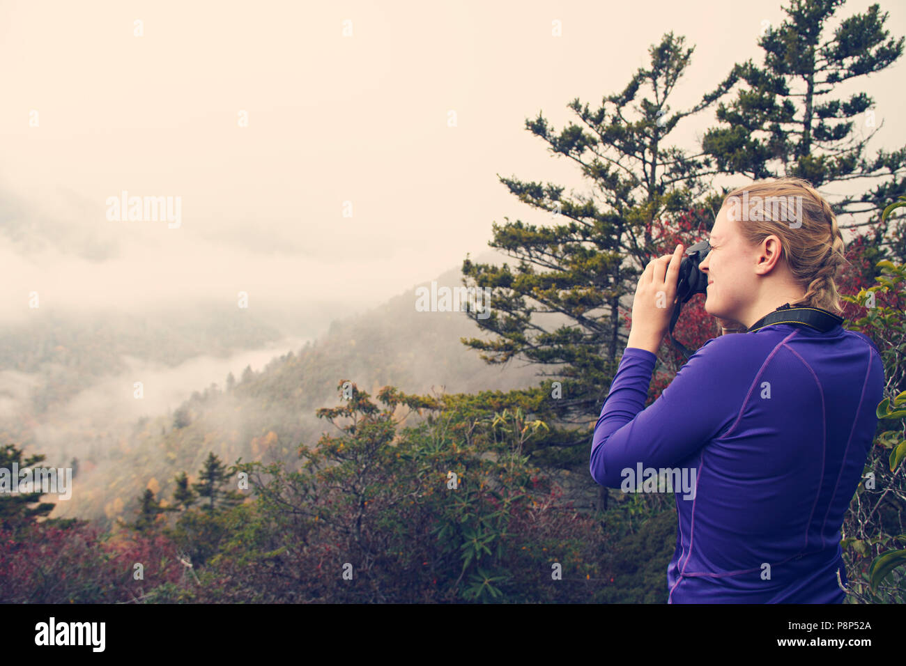 Woman photographing a scenic landscape in Great Smoky Mountain National ...