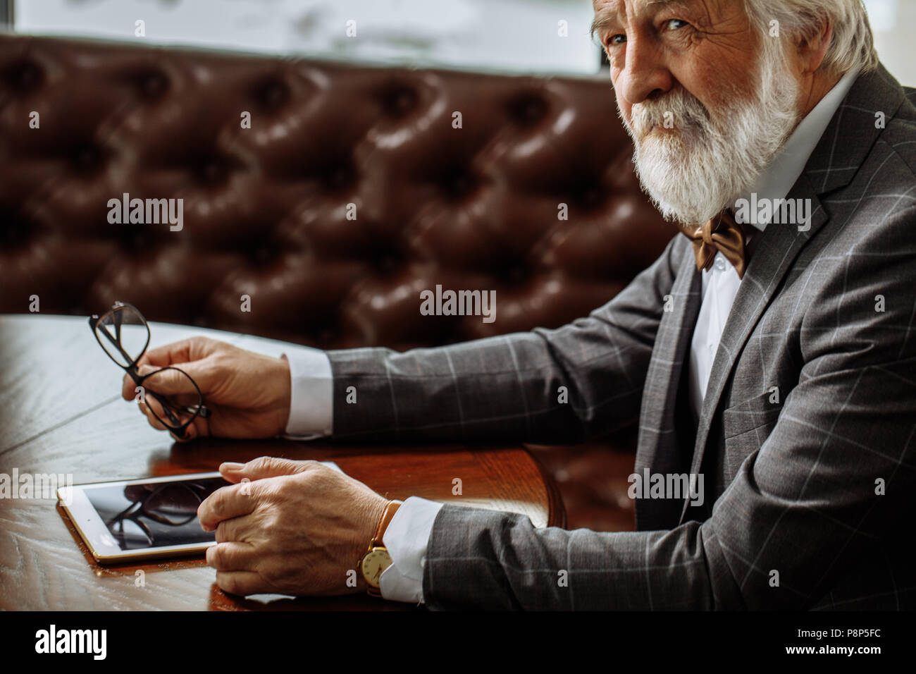 closeup cropped side view photo of genual old chief with white beard ...