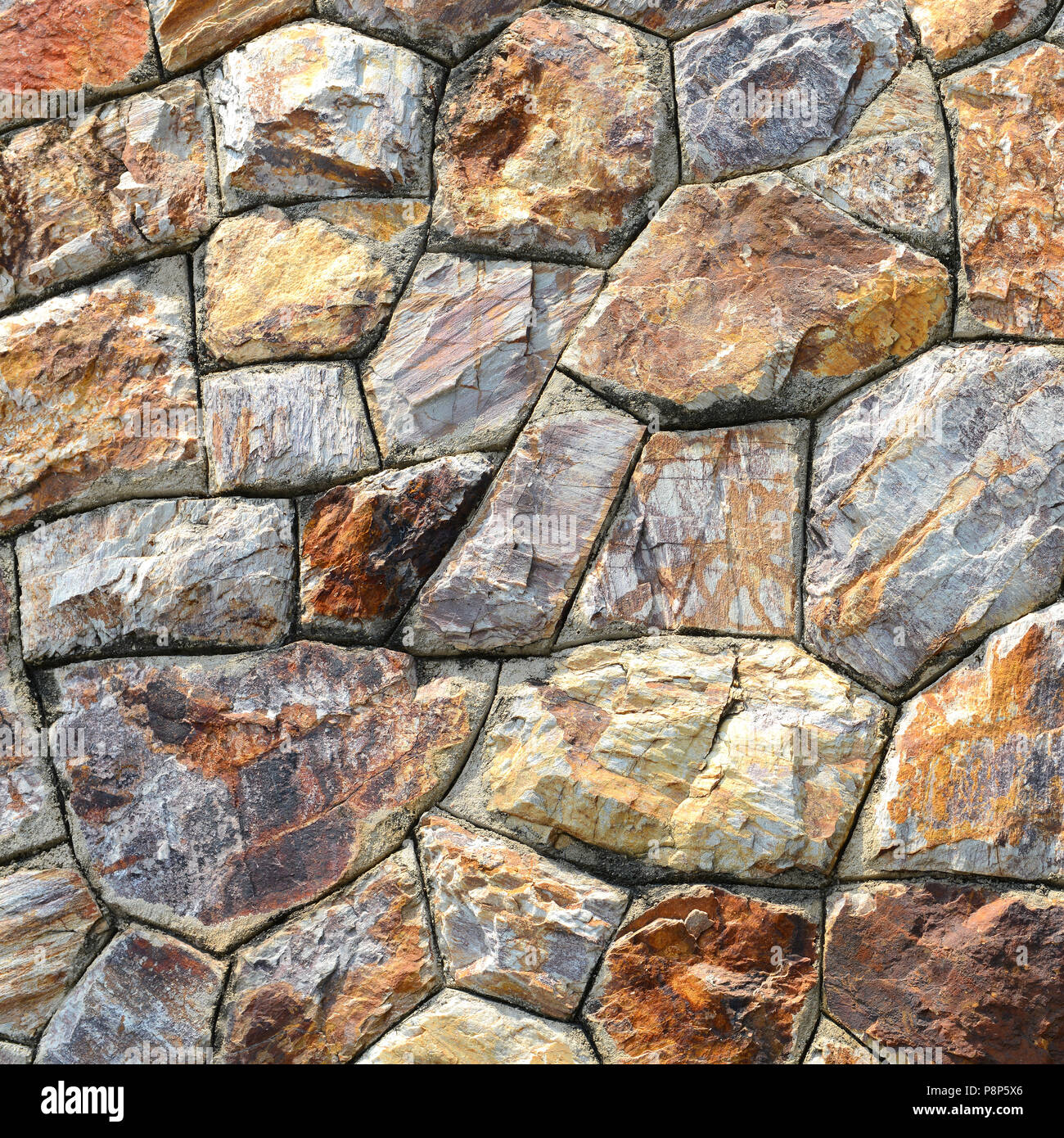 Brown stone wall texture and background Stock Photo - Alamy