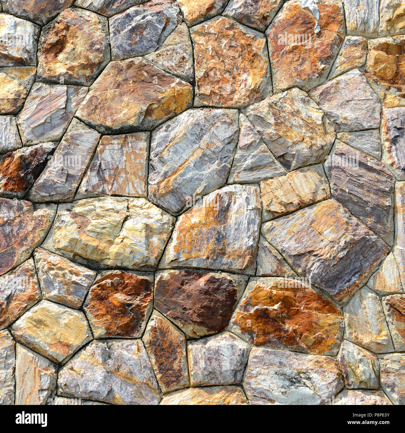 Brown stone wall texture and background Stock Photo - Alamy