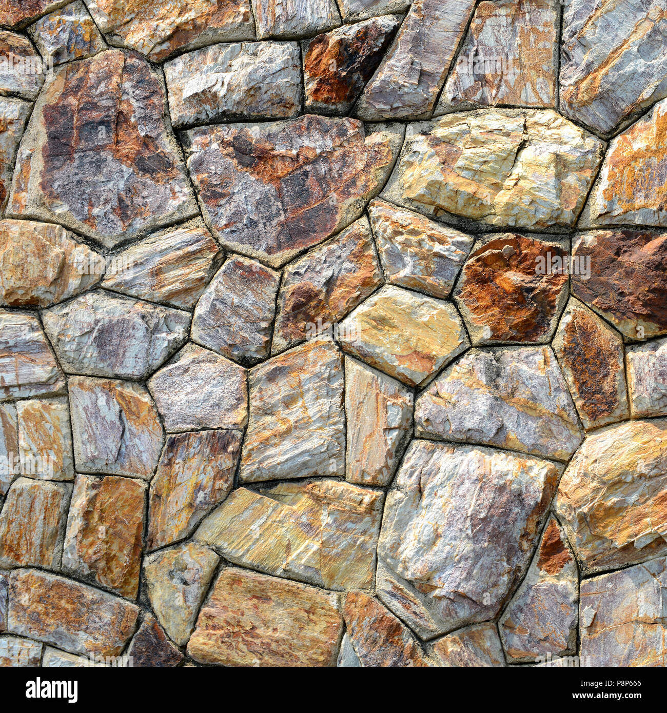 Brown stone wall texture and background Stock Photo - Alamy