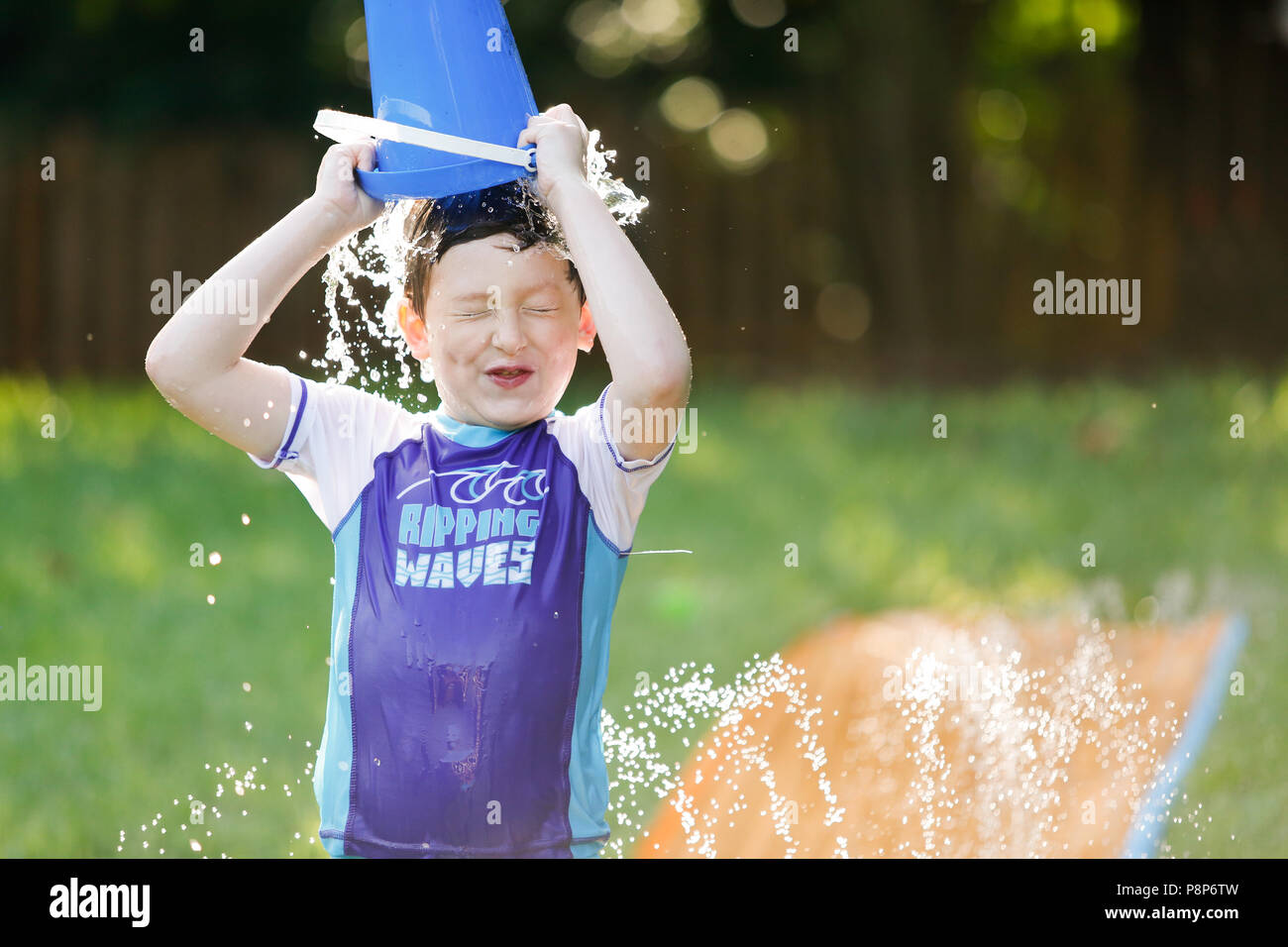 Drenched boy hi-res stock photography and images - Alamy