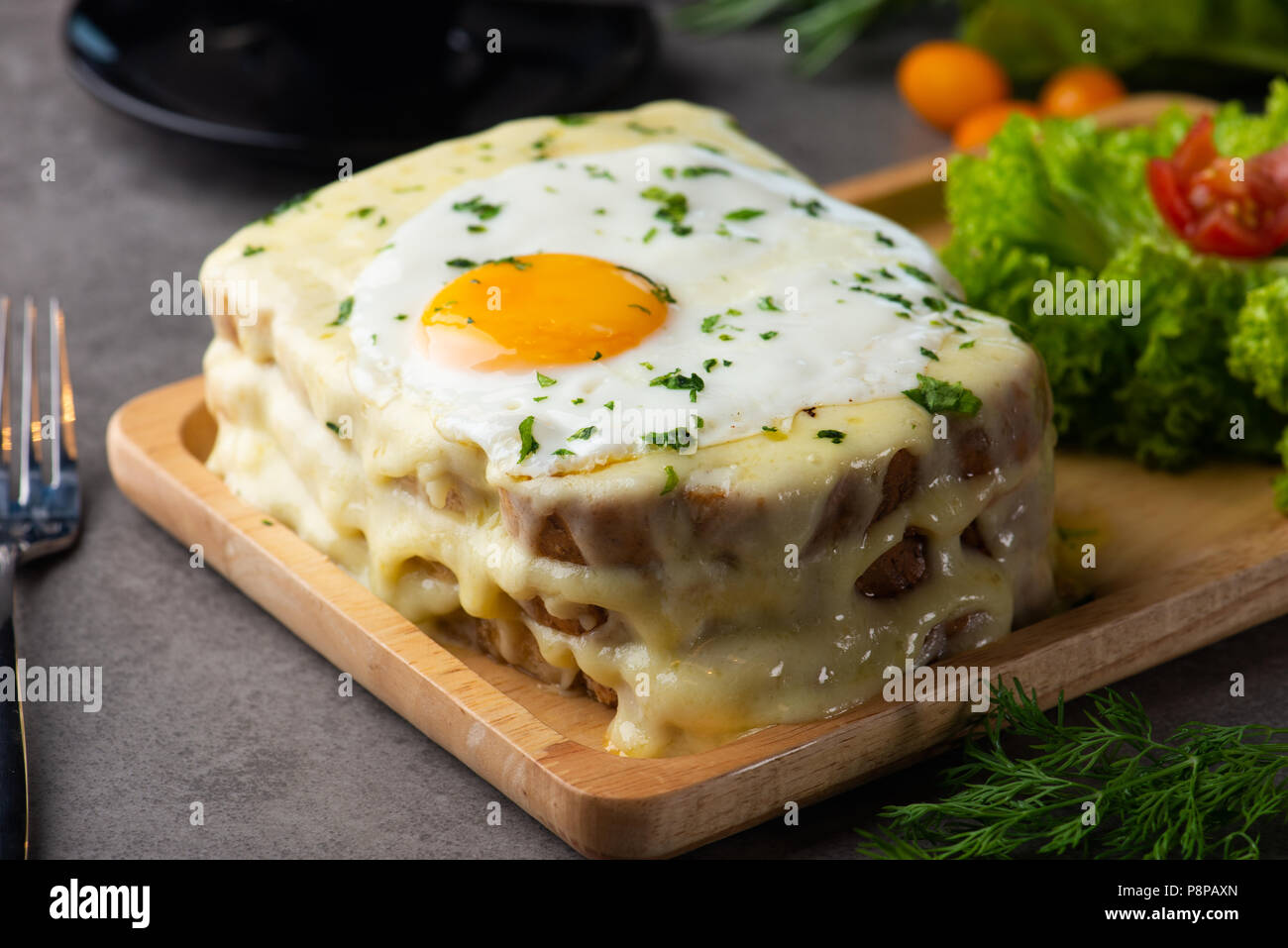 croque-madame toast with egg and cheese Stock Photo - Alamy