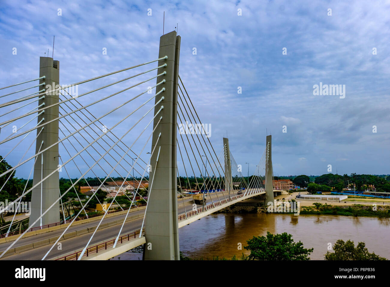 Traffic crosses modern suspension Bridge, 4 April, over Catumbela River ...