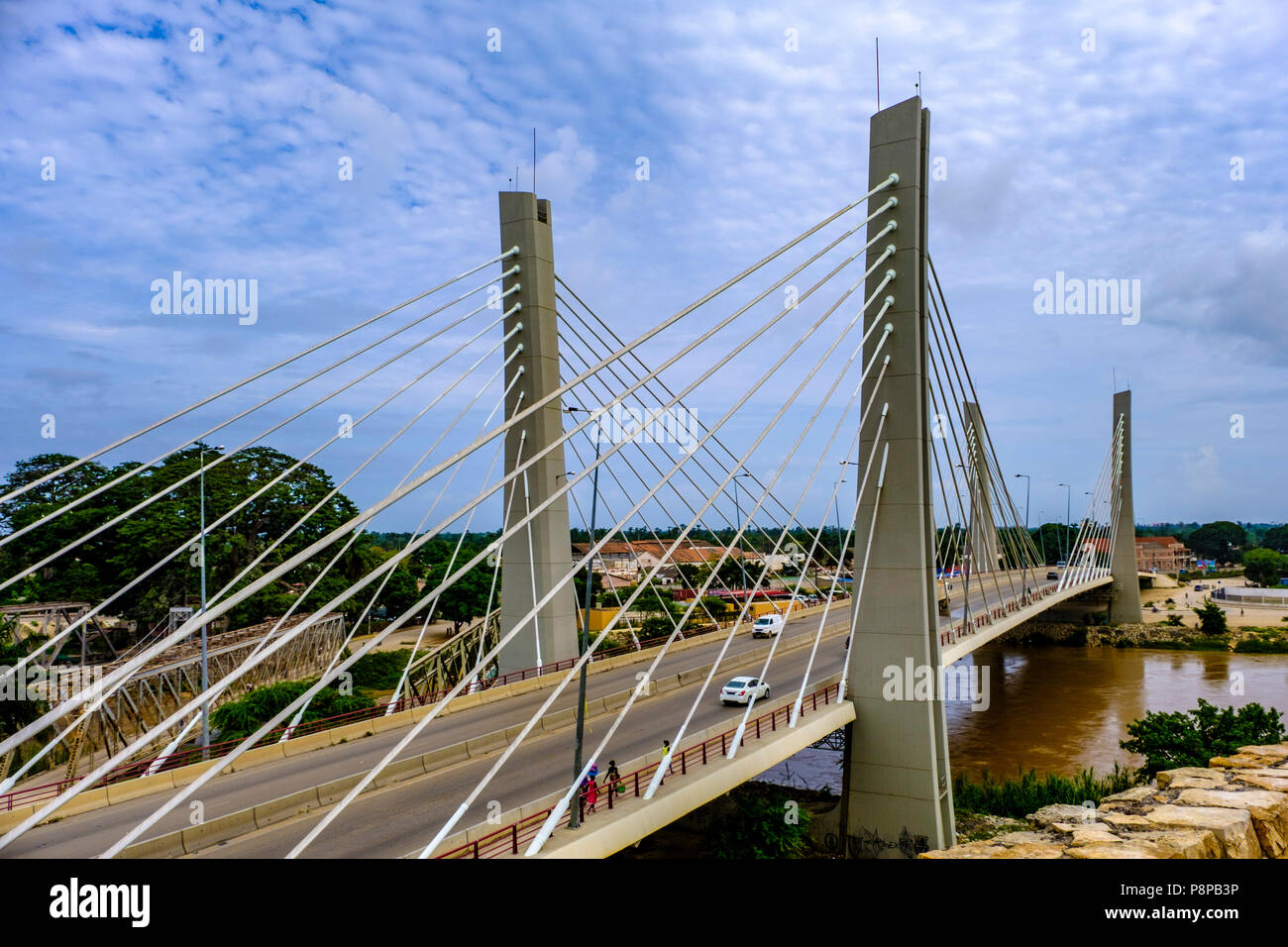 Traffic and pedestrians cross modern suspension Bridge, 4 April, over ...