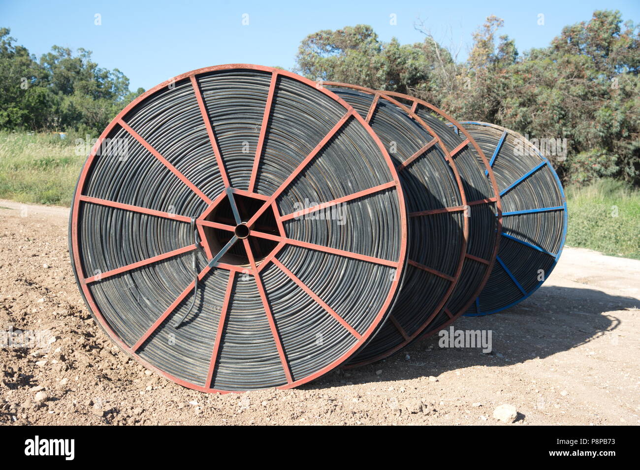 irrigation pipe wheel Stock Photo - Alamy