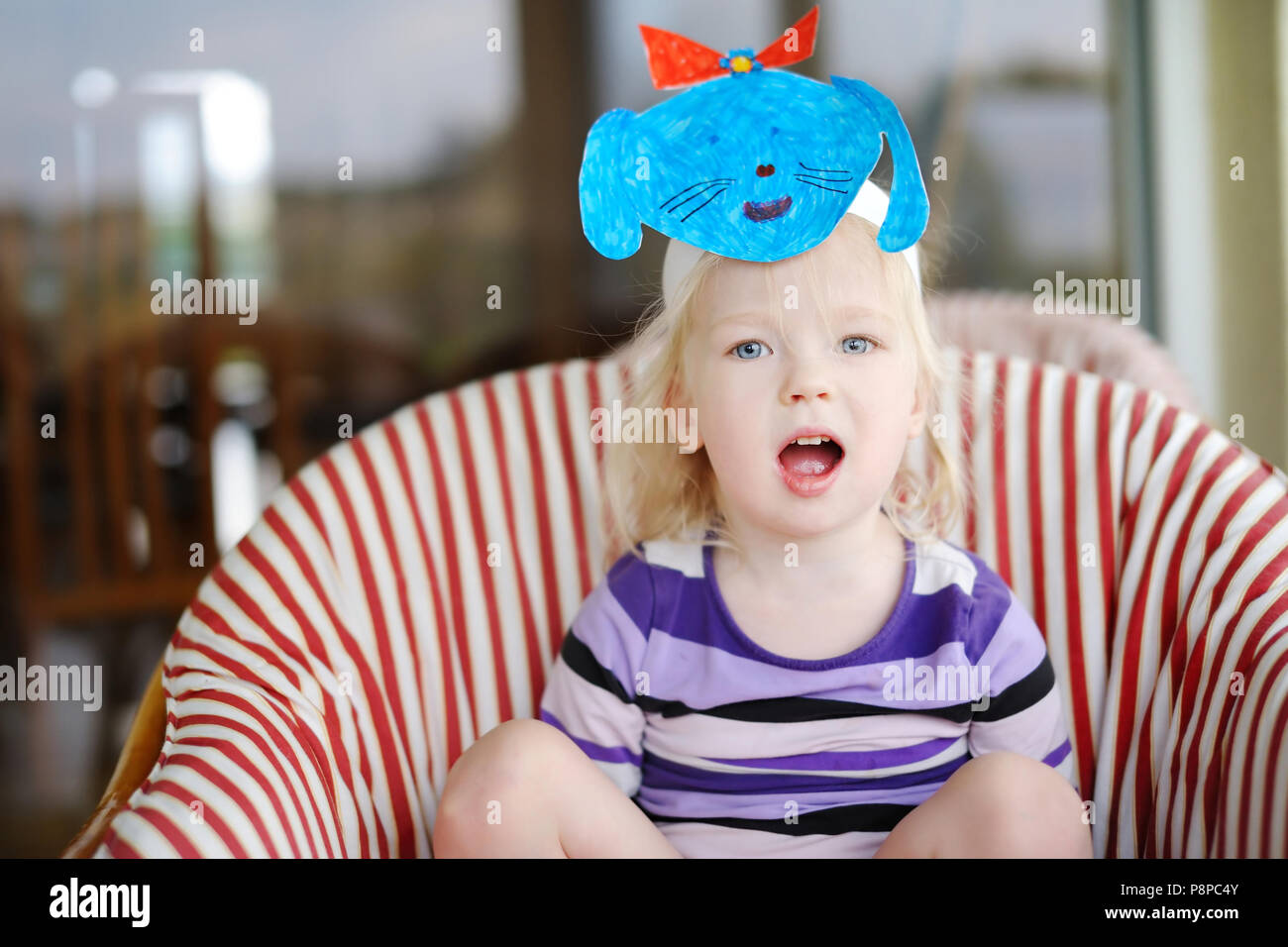 Cute little toddler girl with a self made puppy dog mask Stock Photo ...