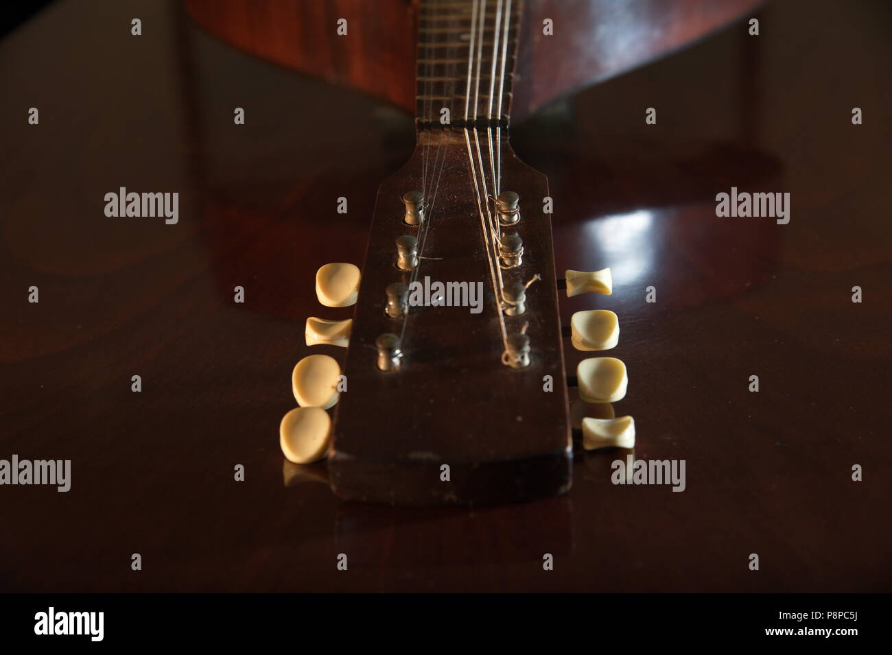 lady foot on mandolina Stock Photo - Alamy