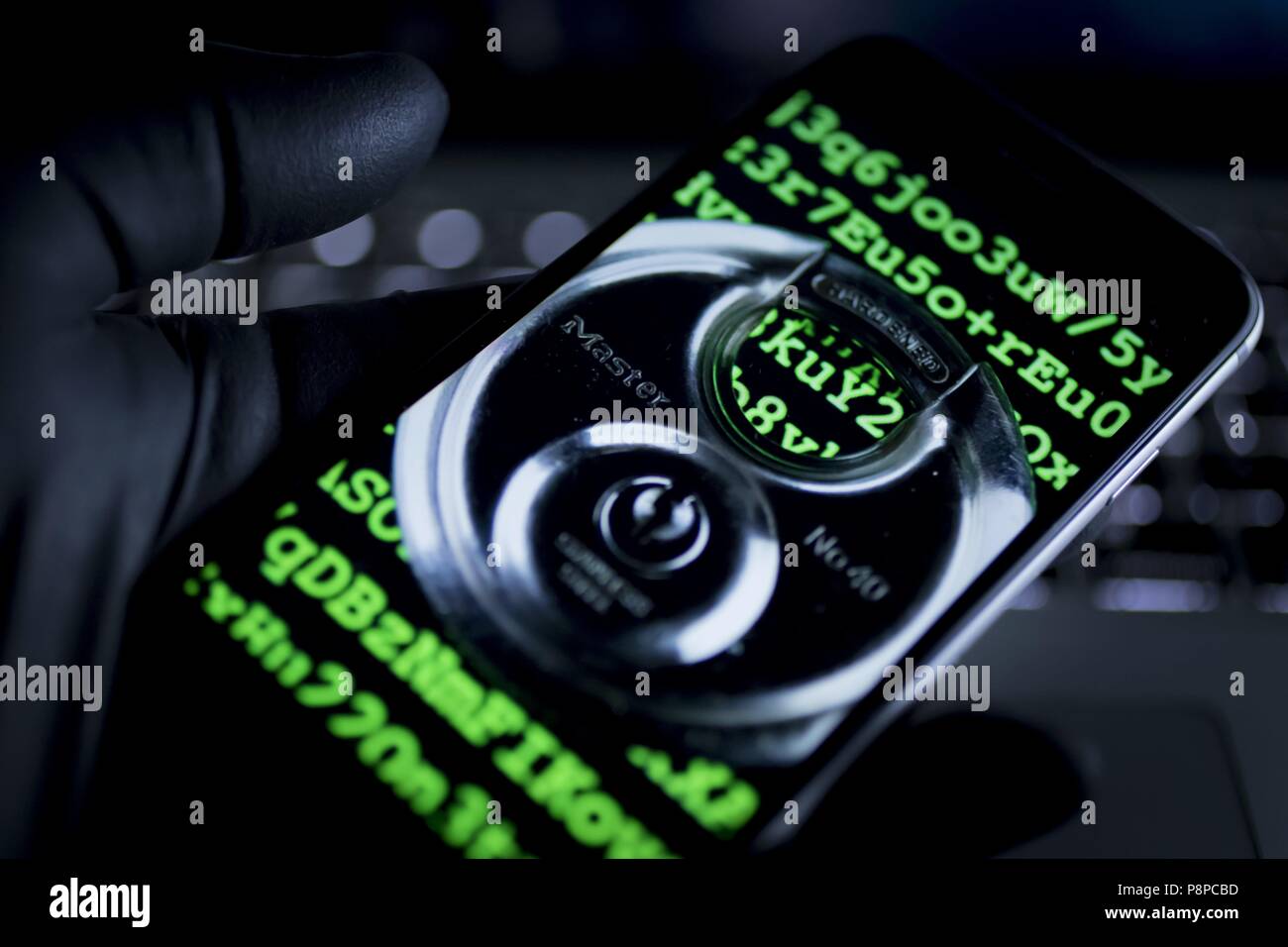 Hand holds an iPhone displaying a strong padlock and the sample public ...