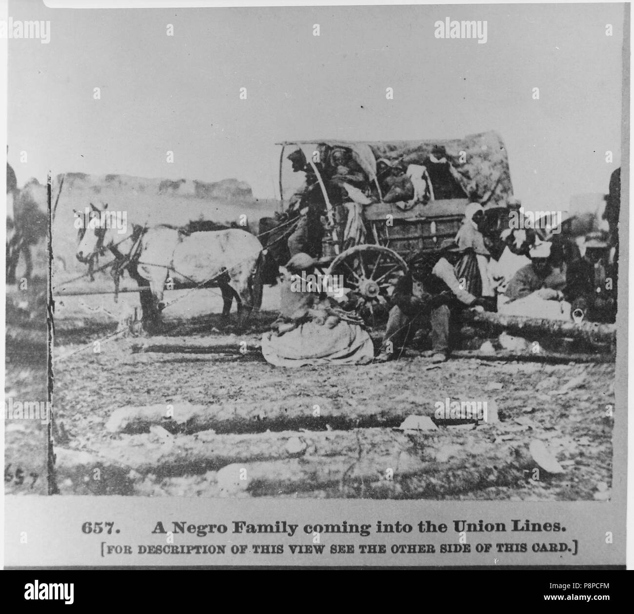 A black family entering Union lines with a loaded cart Stock Photo - Alamy