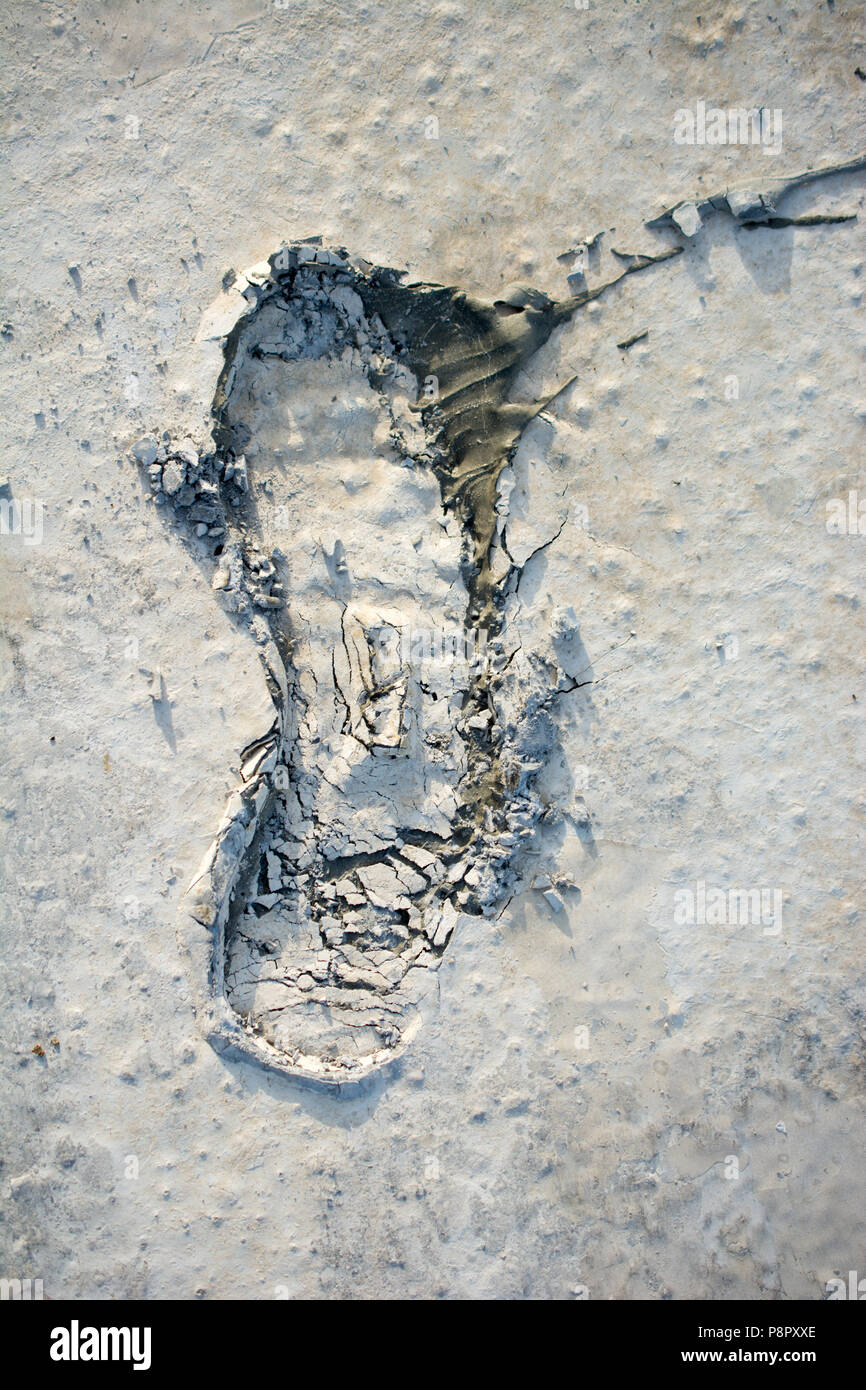 Footstep pattern seen on a concrete background Stock Photo - Alamy