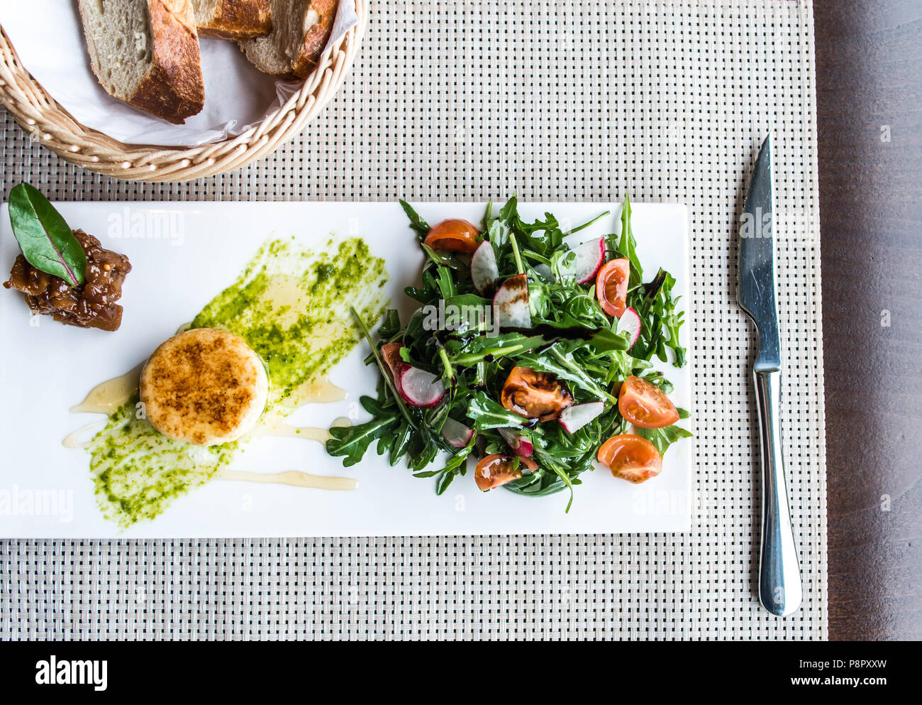 Healthy vegetable summer salad, fresh vegetables and dressing with ...