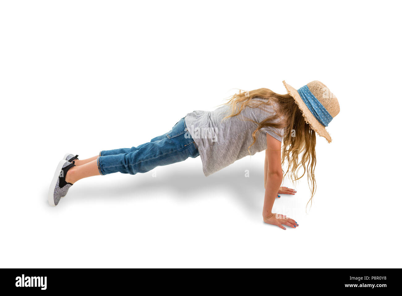 Full length studio shot side view of a girl wearing casual clothes ...