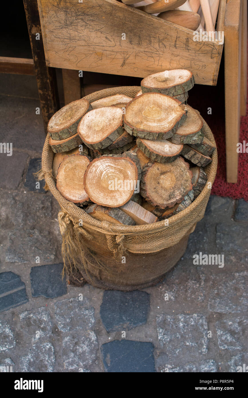 Wood Log cut in round thin pieces in view Stock Photo - Alamy