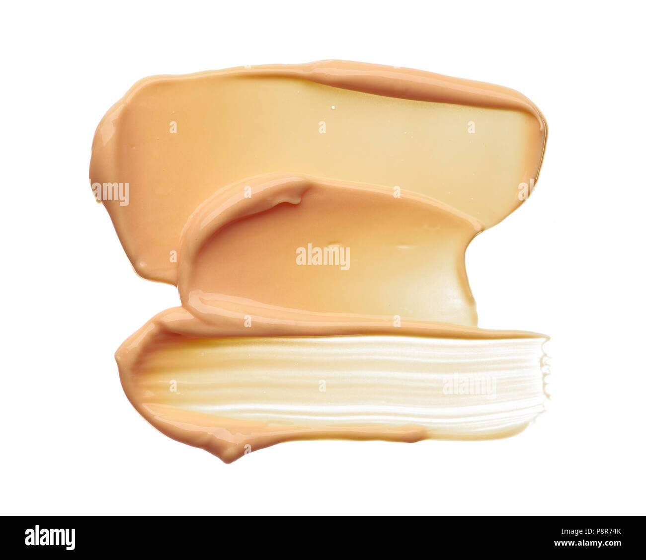Light beige makeup smear of creamy foundation isolated on white ...