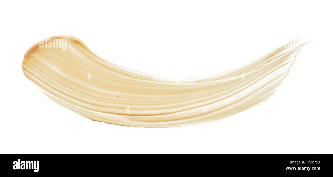 Light beige makeup smear of creamy foundation isolated on white ...