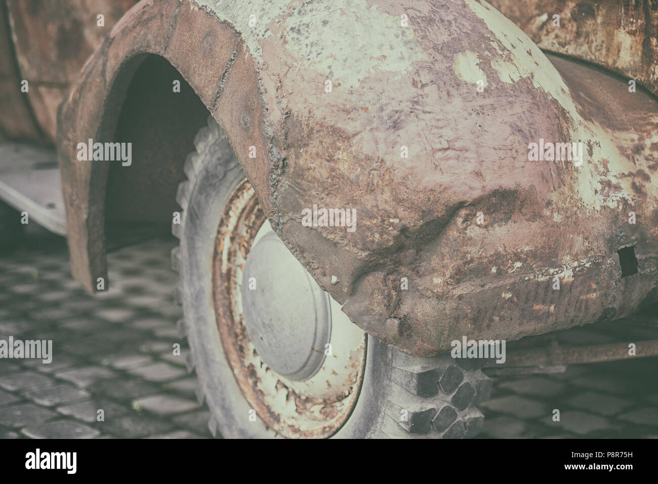 Rusty crumpled front wing with the wheel and tire vintage car Stock ...