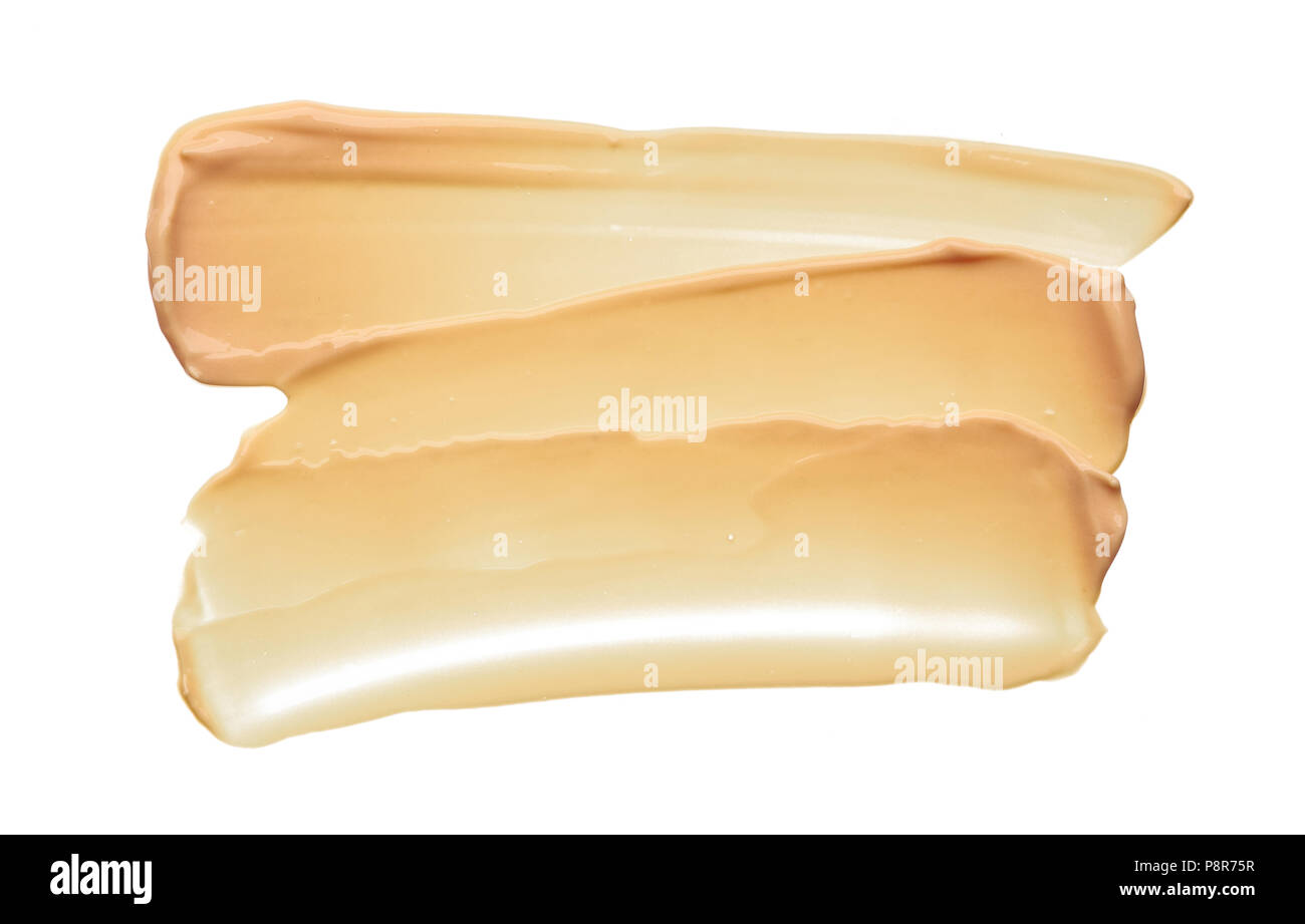 Light beige makeup smear of creamy foundation isolated on white ...