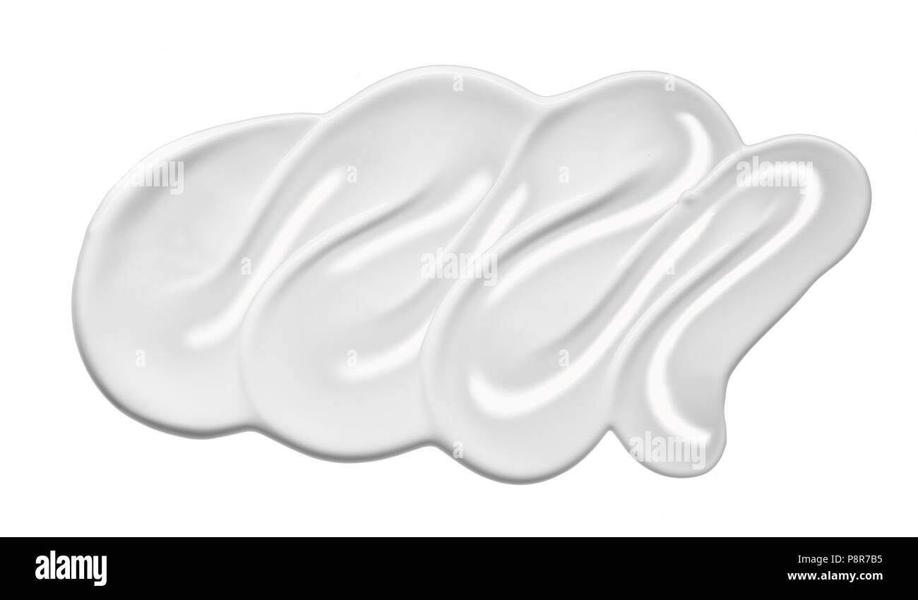 White smear of cosmetic cream isolated on white background. Creamy ...