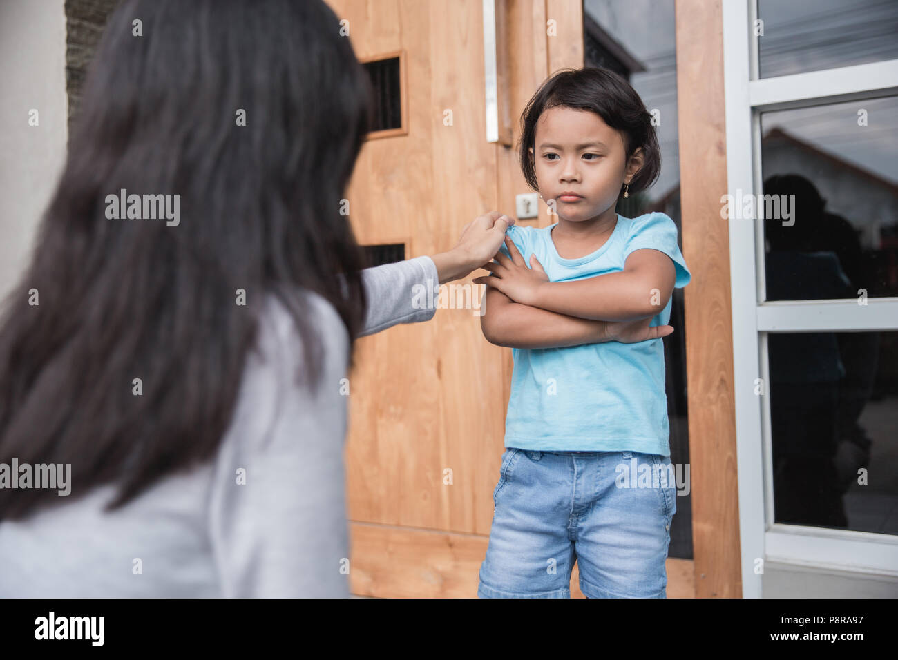 mother rebuking a little child for bad behavior. scolding her daughter Stock Photo - Alamy