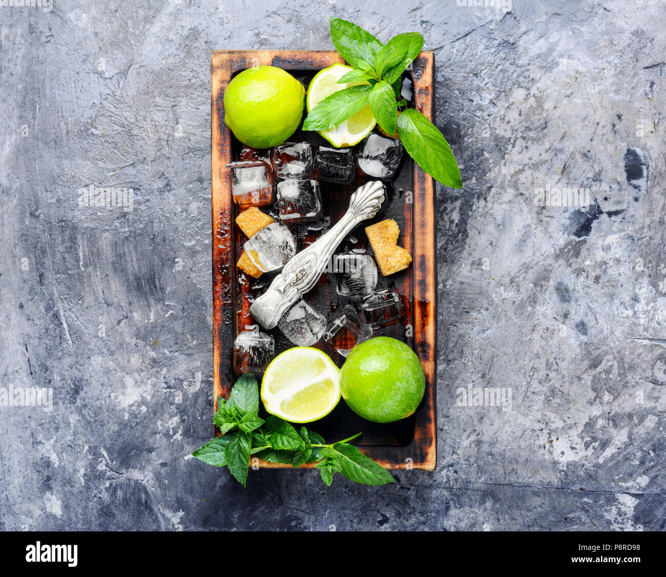 Mojito ingredients. Lime, mint and cane suga Stock Photo - Alamy